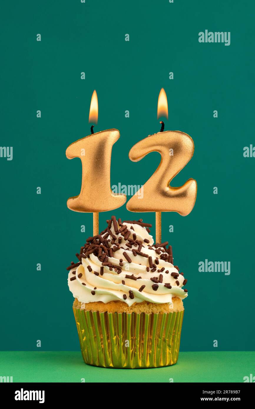 Birthday card with candle number 12 - Green background Stock Photo - Alamy