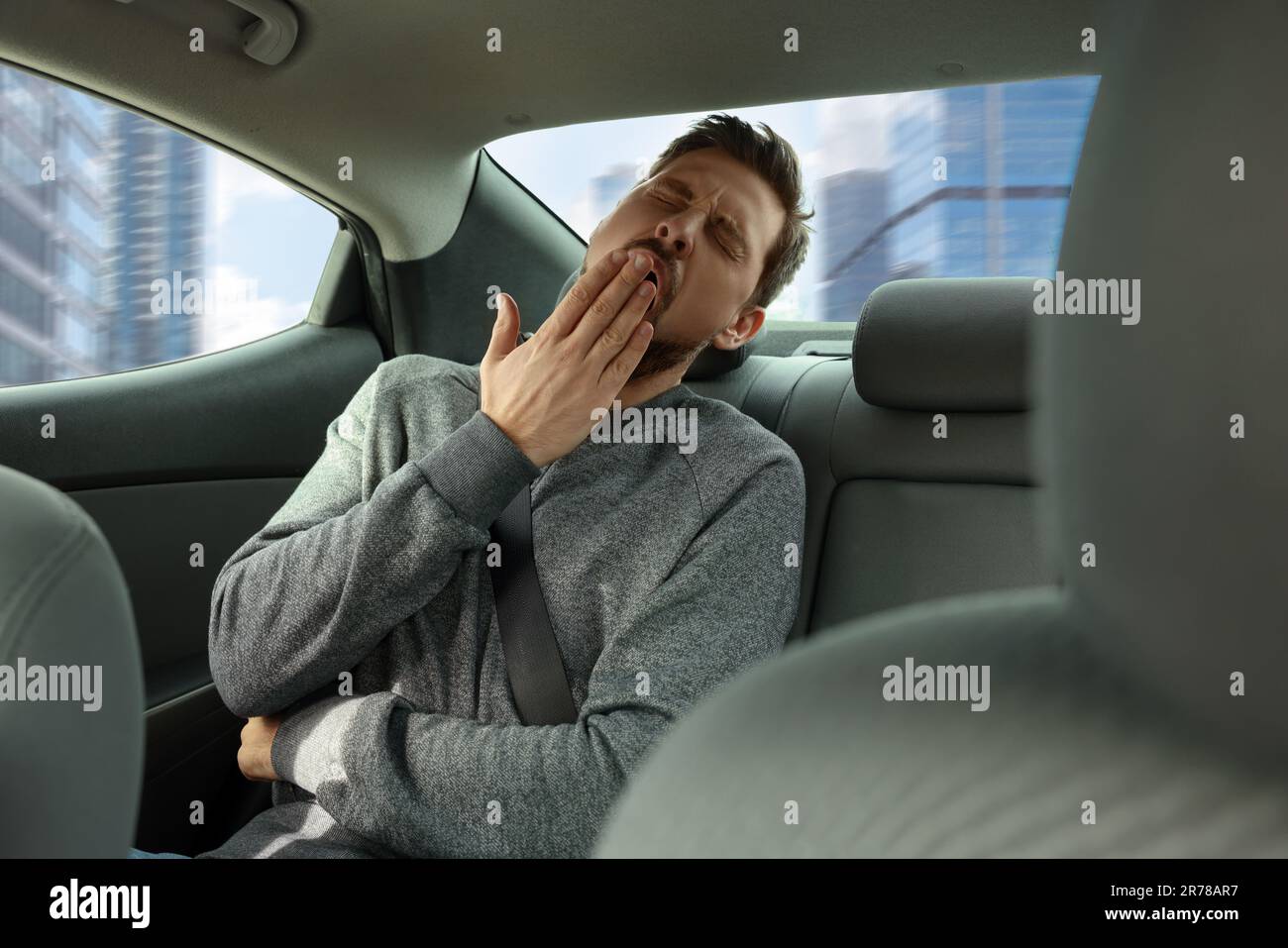 Sleepy tired man yawning in modern car Stock Photo - Alamy