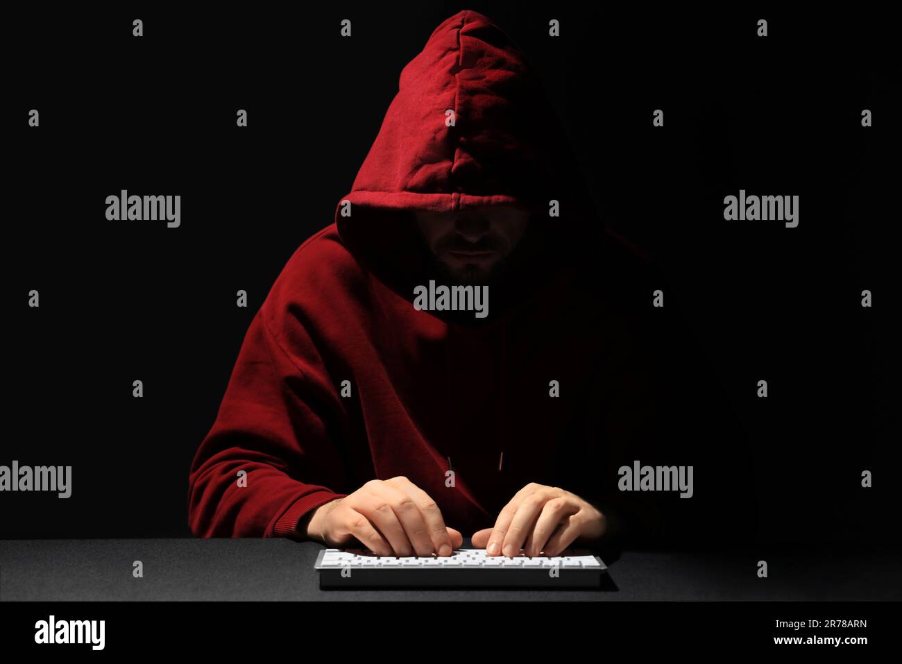 Hacker working with keyboard in dark room. Cyber attack Stock Photo - Alamy