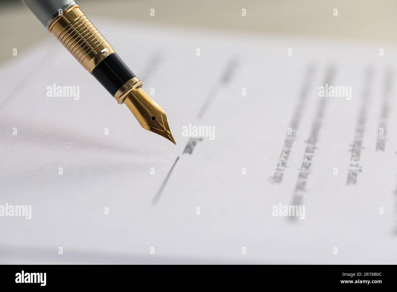 Signing document with fountain pen, closeup. Notary services Stock ...