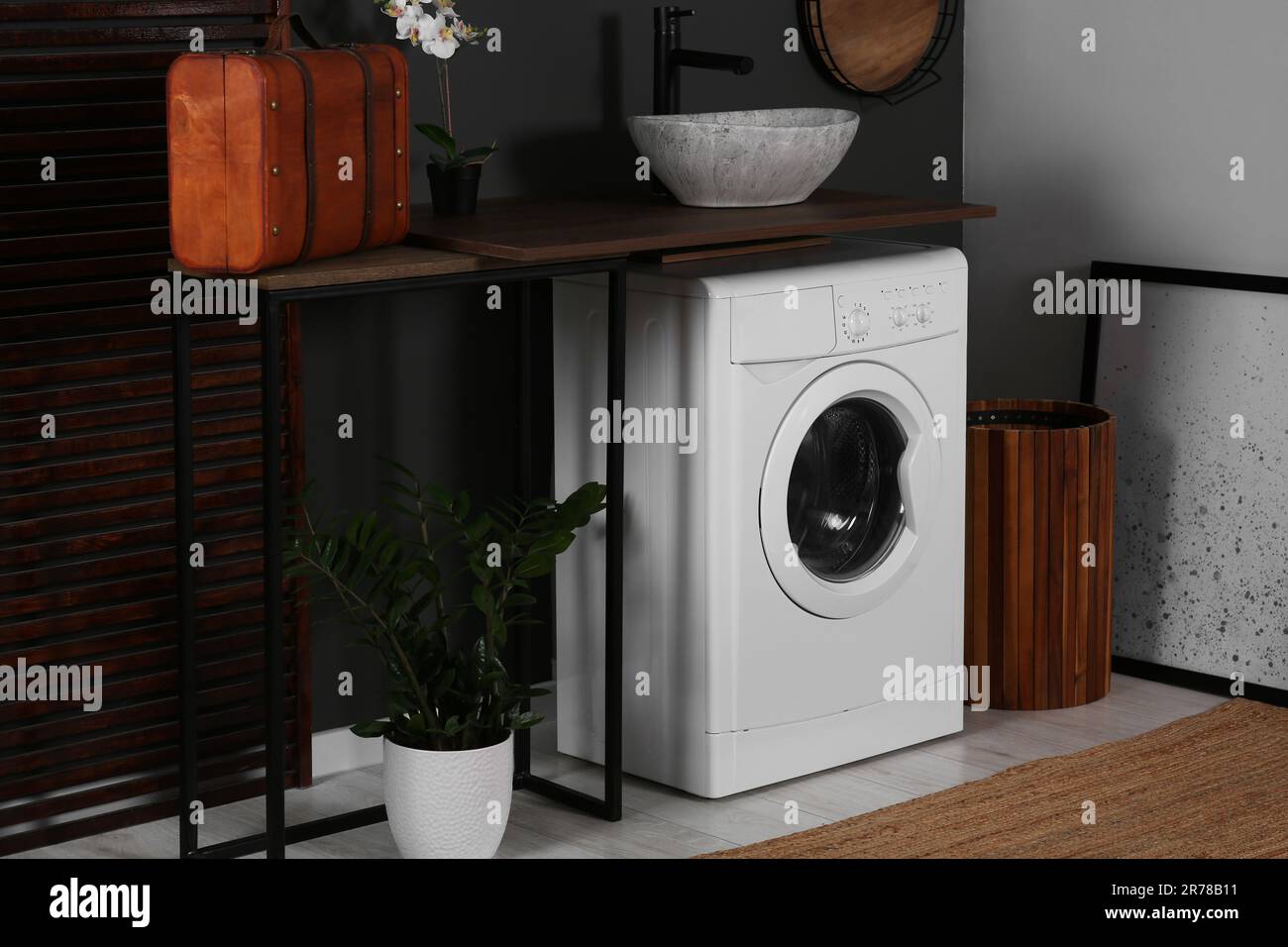Stylish laundry room with washing machine. Interior design Stock Photo ...