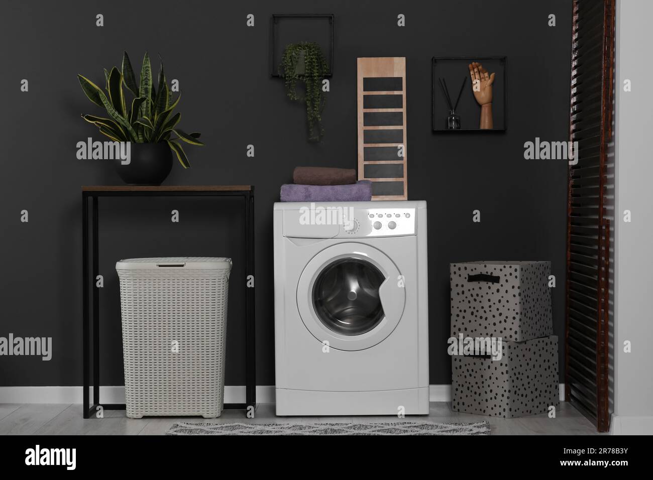 Stylish laundry room with washing machine. Interior design Stock Photo ...