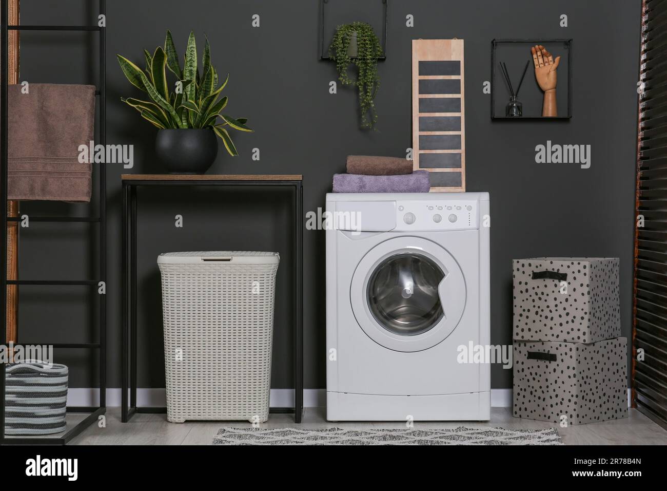 Stylish laundry room with washing machine. Interior design Stock Photo ...