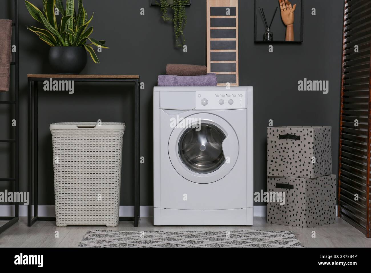 Stylish laundry room with washing machine. Interior design Stock Photo ...