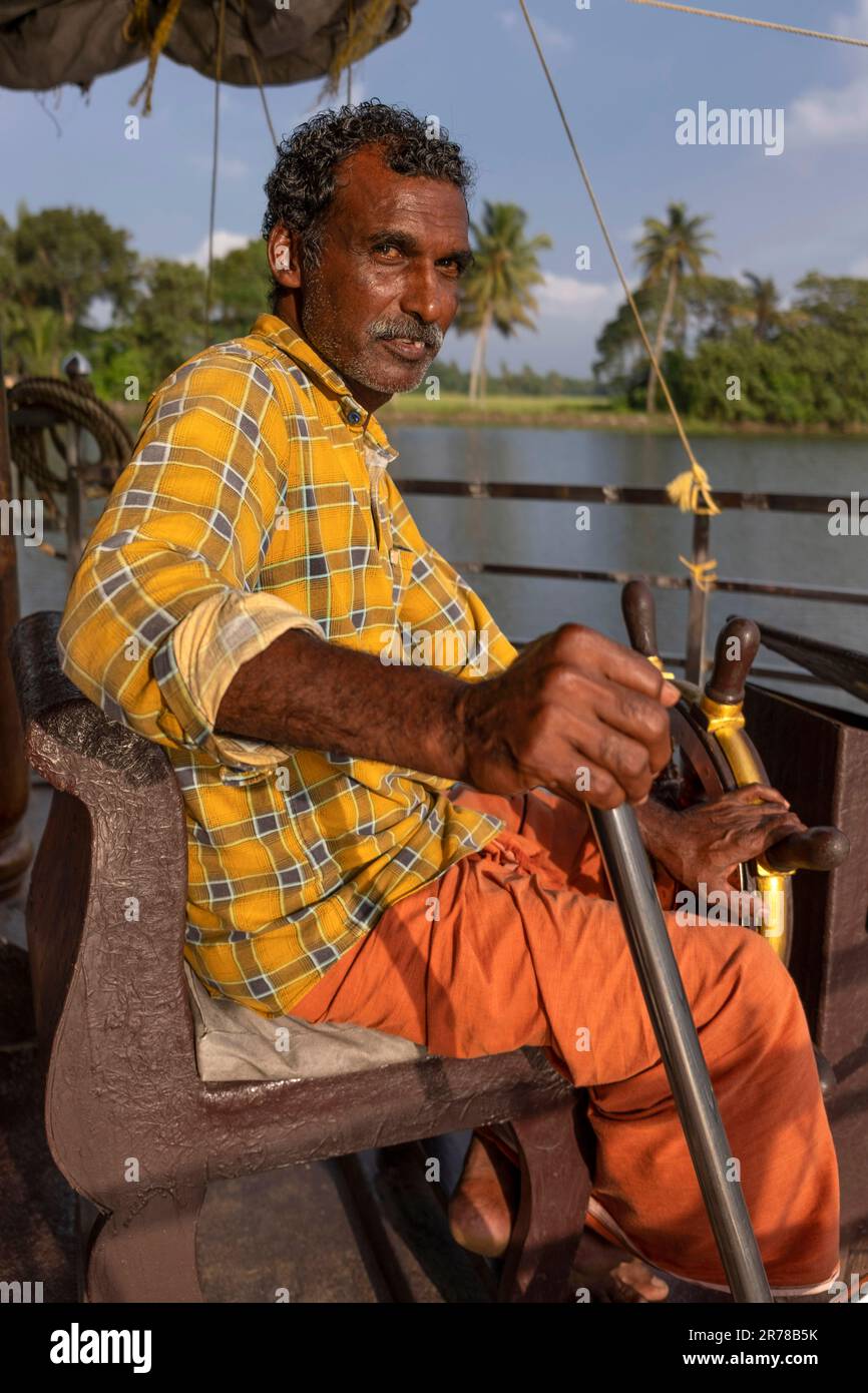 House boat captain on Vembanad Lakes, near the Arabian Sea, Alleppey ...