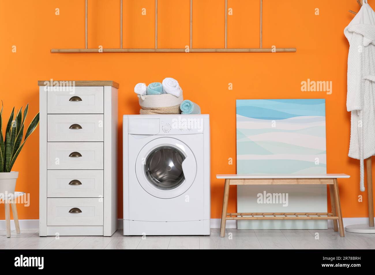Stylish laundry room with washing machine. Interior design Stock Photo ...