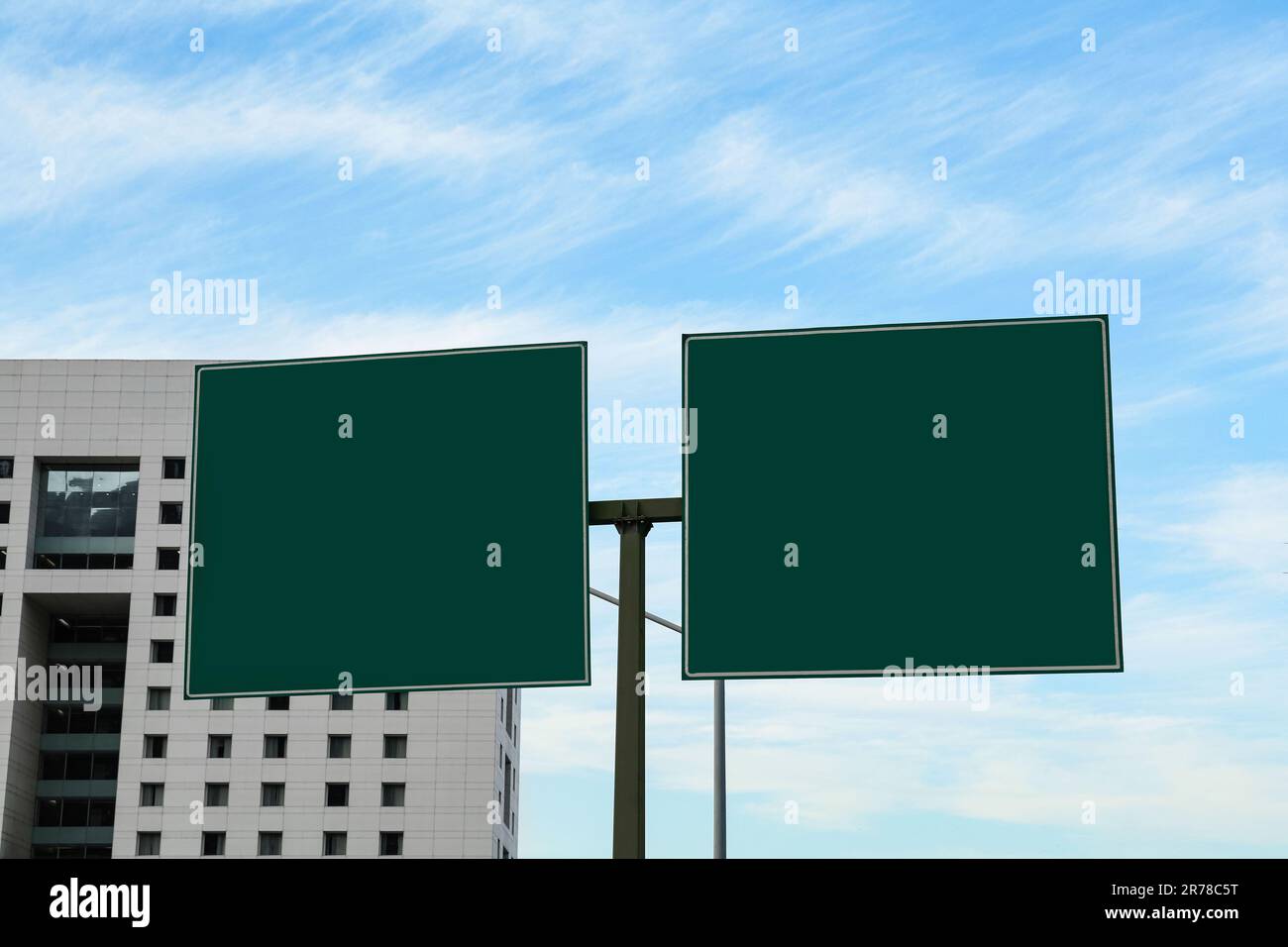 Road signs with directions on city street Stock Photo - Alamy