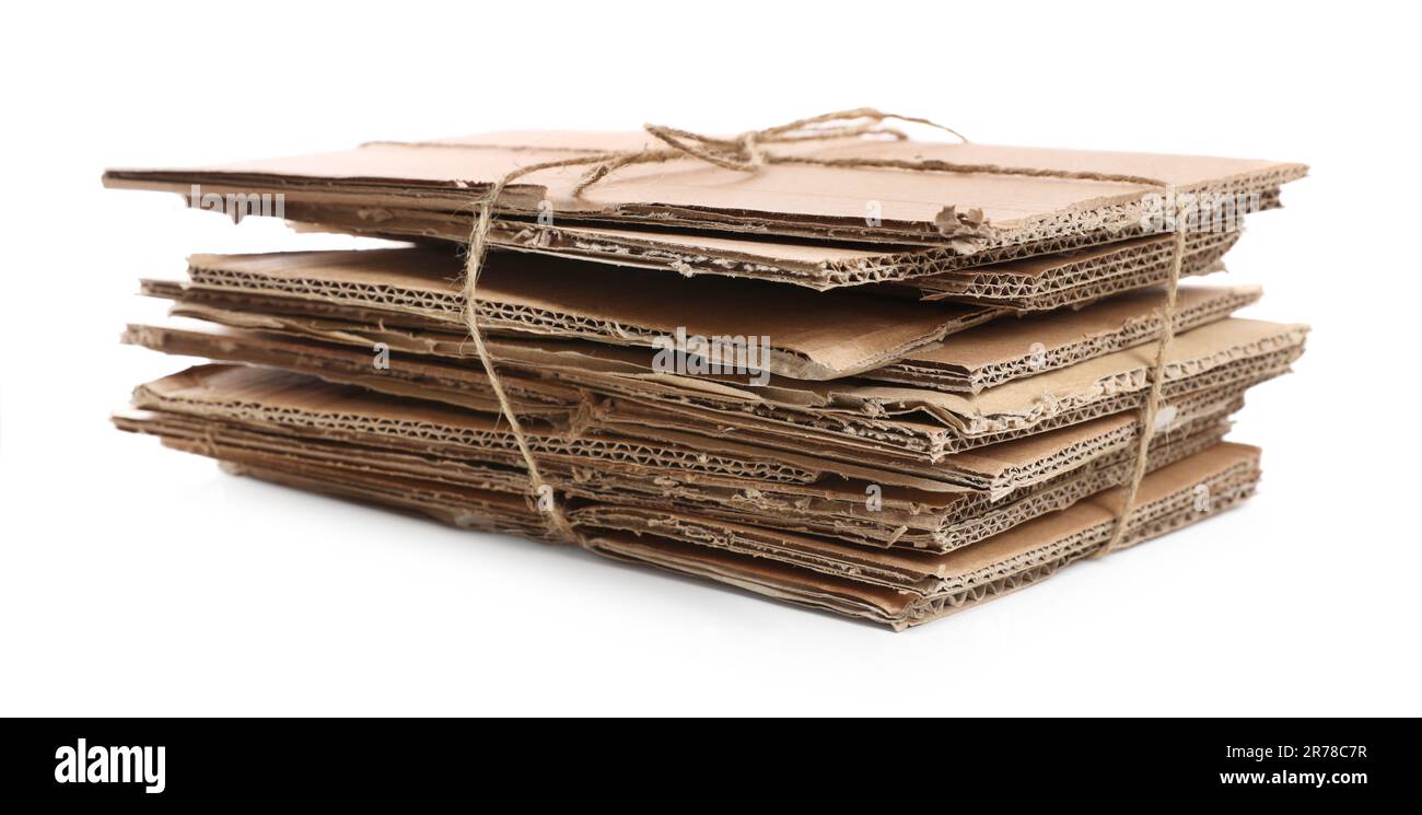 Waste paper tied with twine isolated on white Stock Photo - Alamy