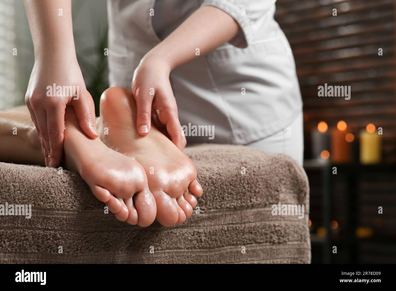 Woman receiving feet hi-res stock photography and images - Alamy