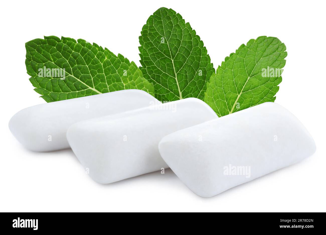 Menthol chewing gum pillows and mint leaves on white background Stock ...