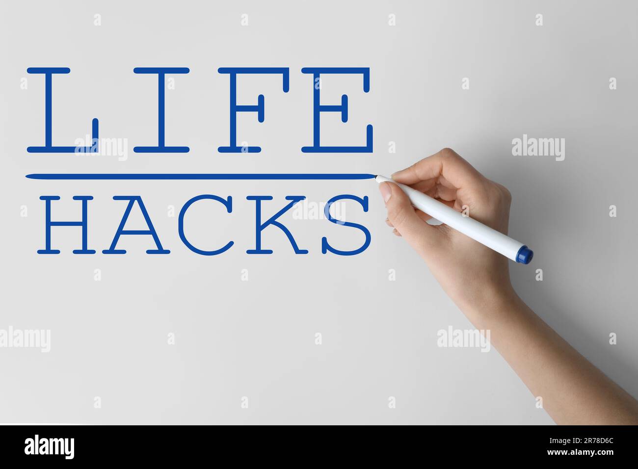 Life hacks. Woman underlining word with marker on whiteboard, closeup ...