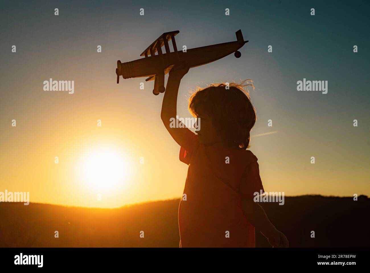 Dreaming kid. Boy pilot aviator with airplane. Dreams of traveling ...