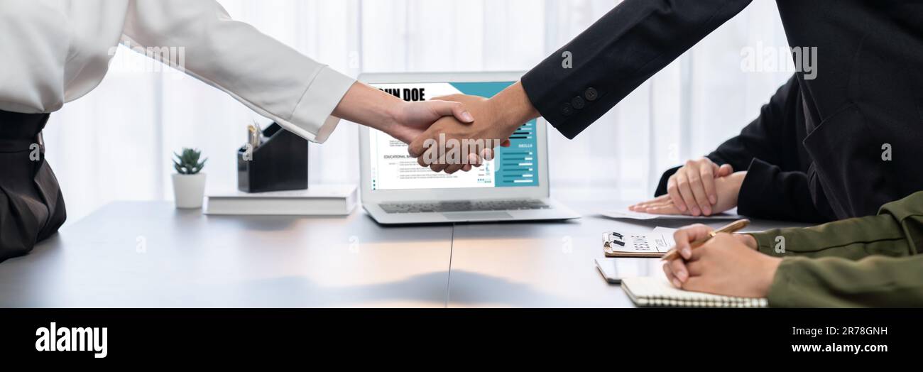 Successful job interview at business office end with handshake. Hired ...