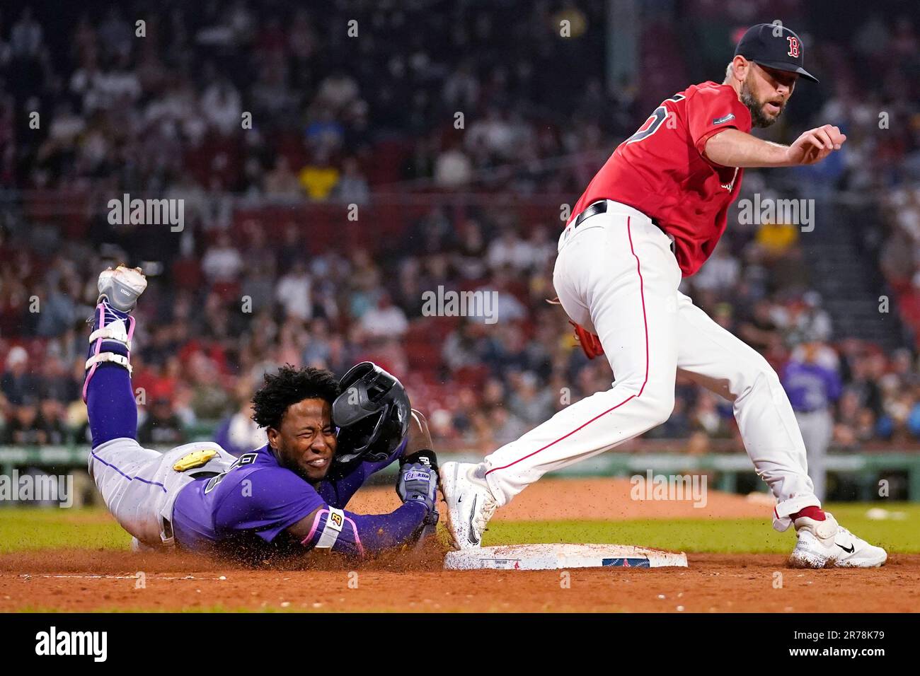 Colorado Rockies' Jurickson Profar, left, is put out by Boston Red Sox ...