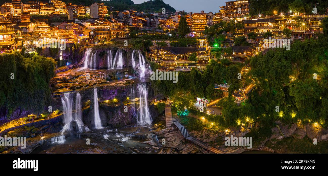 Beautiful ancient town in China with waterfall and traditional houses ...