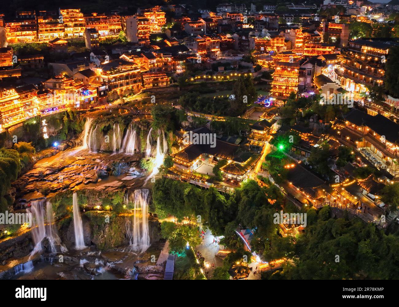 Beautiful ancient town in China with waterfall and traditional houses ...