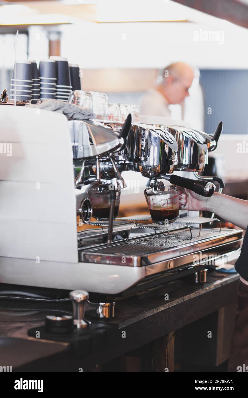 Barista espresso machine making man employee worker working hi-res ...