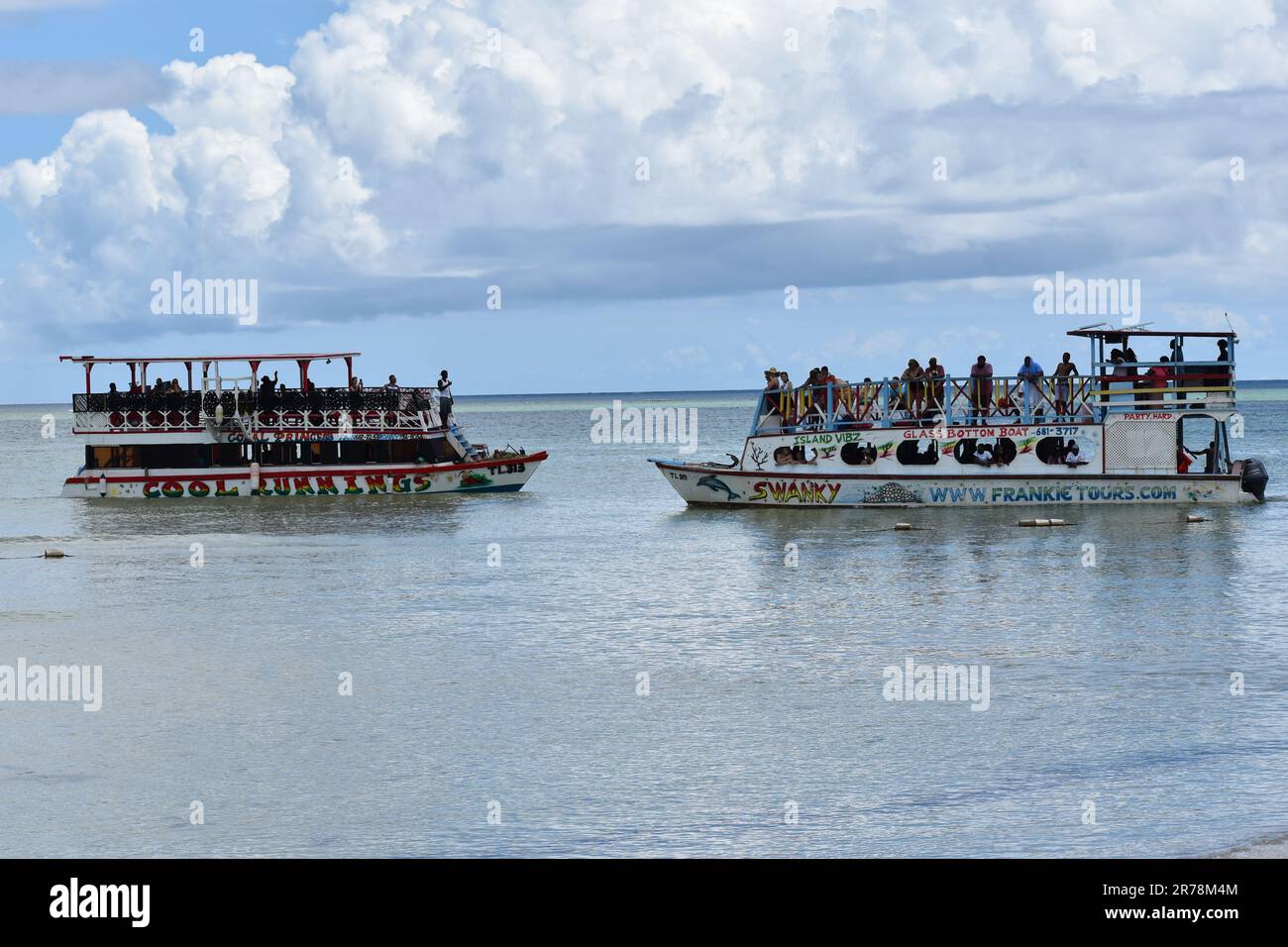 Glass bottom boats in Pigeon Point carrying tourists on tours to see ...