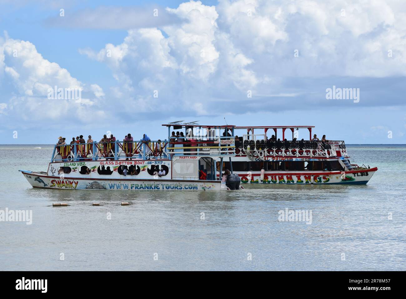 Glass bottom boats in Pigeon Point carrying tourists on tours to see ...
