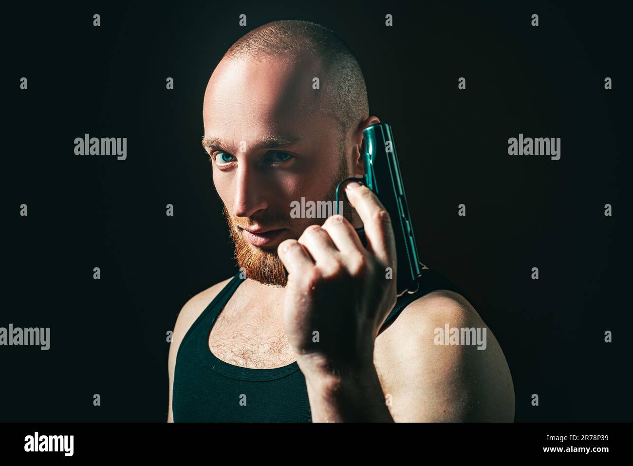 Man shooting firearm handgun, makarov pistol in a firing range ...
