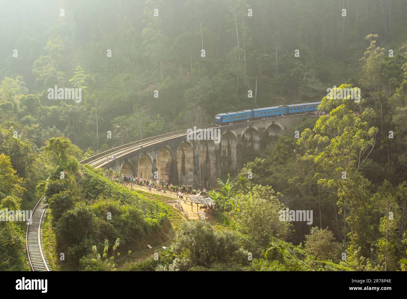 Train crosses Demodara nine arch bridge. Sri Lanka. Aerial background ...
