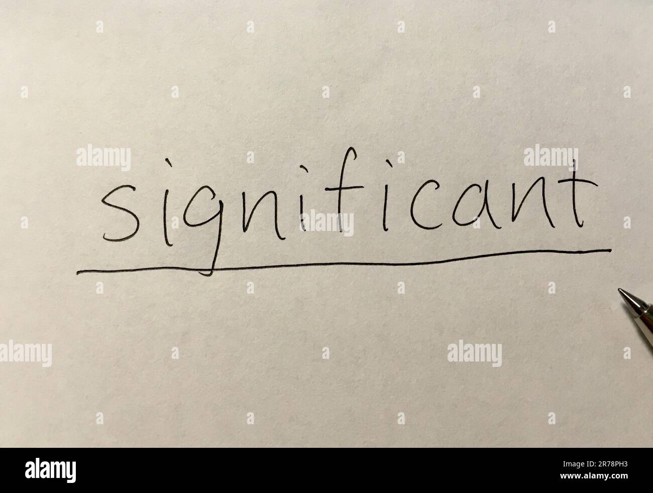 Significant concept word on paper background Stock Photo - Alamy