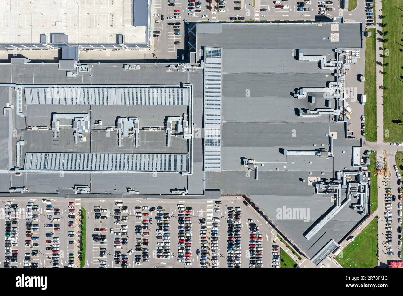 shopping mall roof with ventilation system and skylights. crowded ...