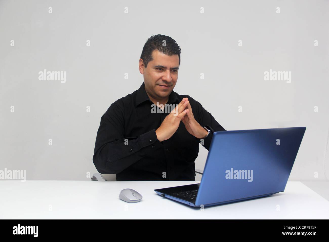 Latino adult man speaks Mexican sign language with a deaf person ...