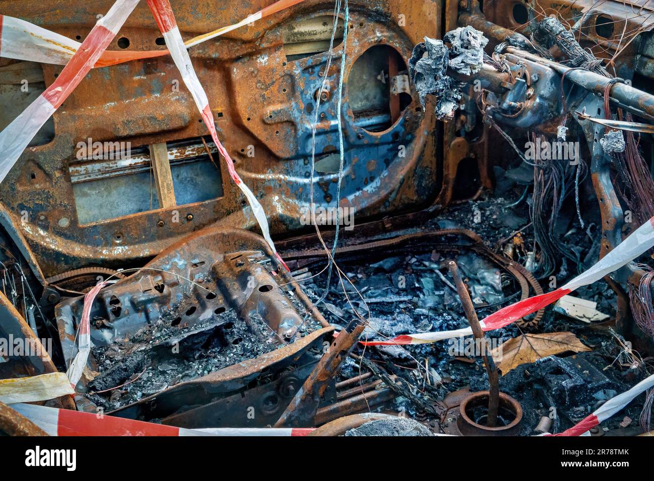 A close-up of an interior of a dilapidated car that has been destroyed ...