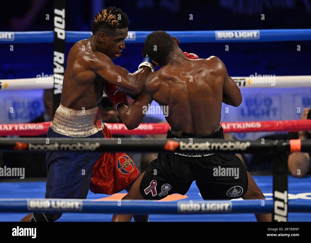 NEW YORK, NY - JUNE 10: Bruce Carrington (red tape) takes on Luis ...