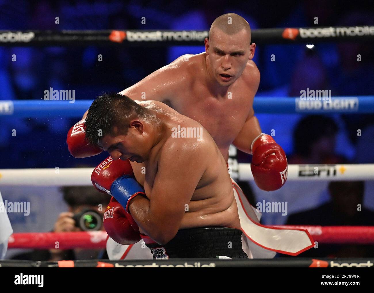 NEW YORK, NY - JUNE 10: Damian Knyba (red tape) takes on Helaman Olguin ...