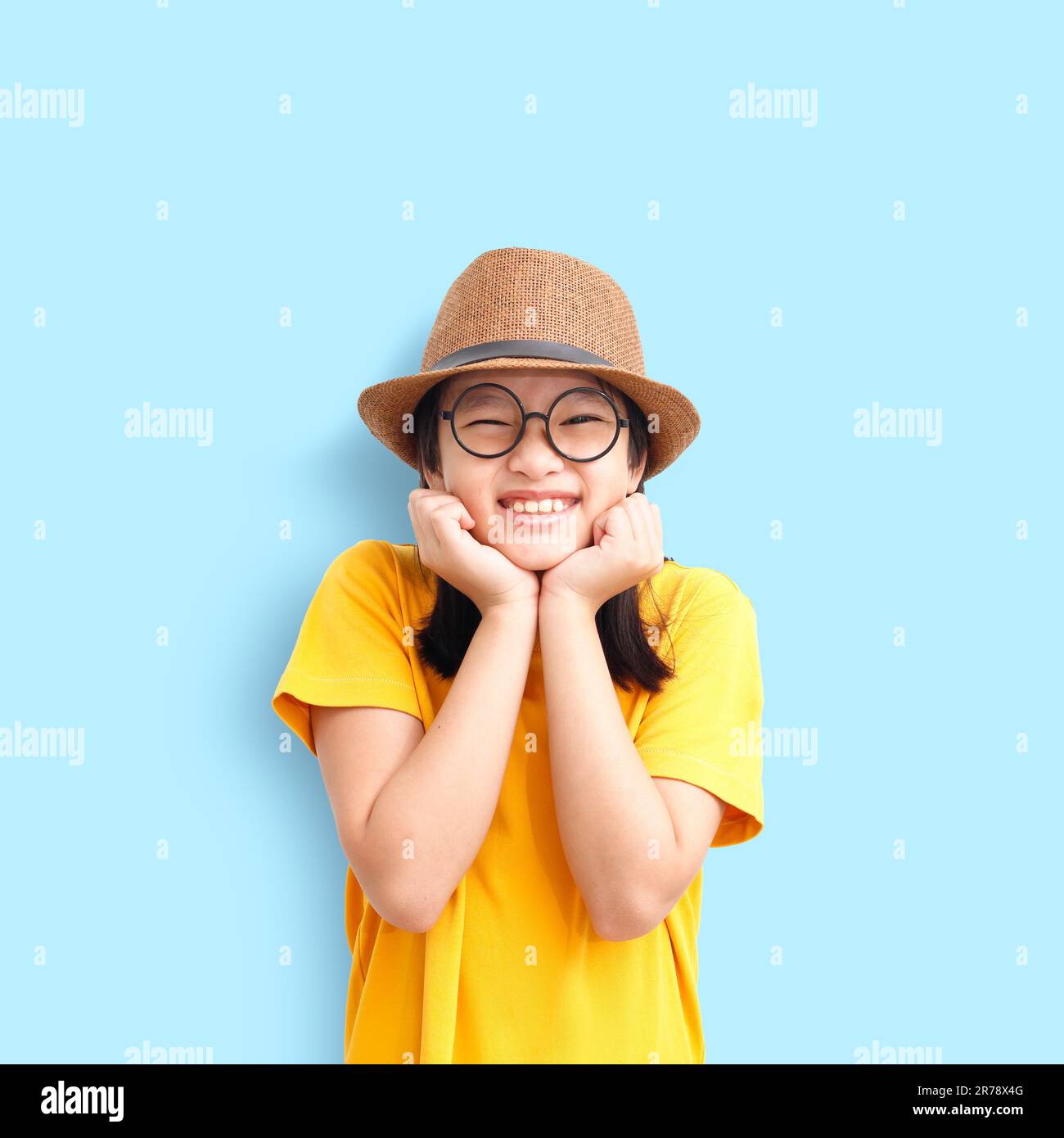 The little girl has an extremely blushed, happy expression Stock Photo ...