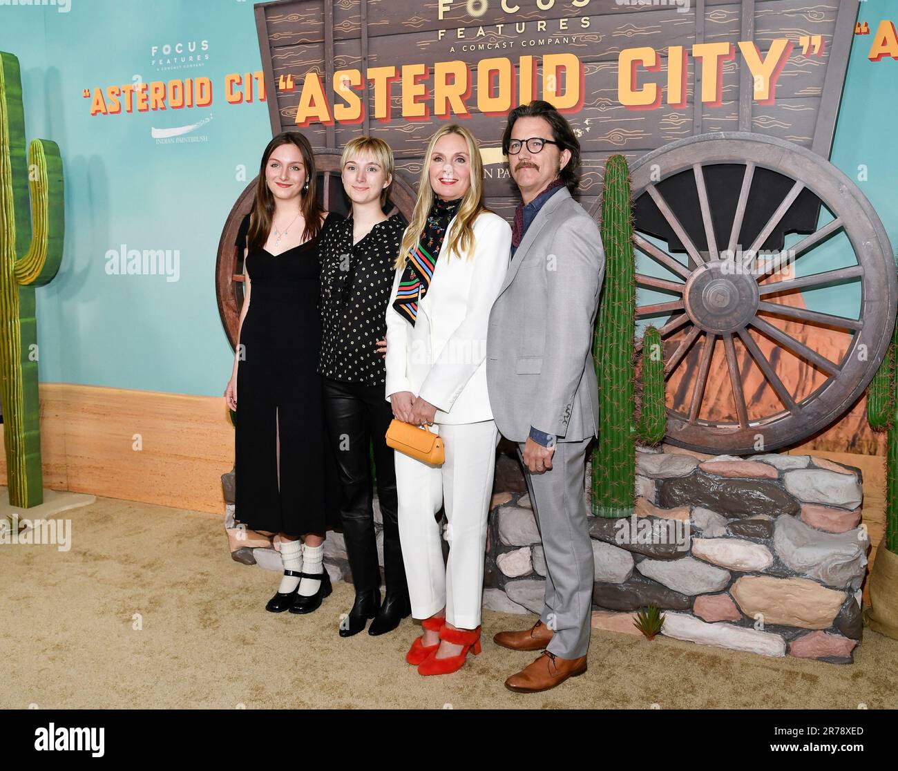 Hope Davis, poses with her husband Jon Patrick Walker and their daughters Georgia Walker and Mae ...