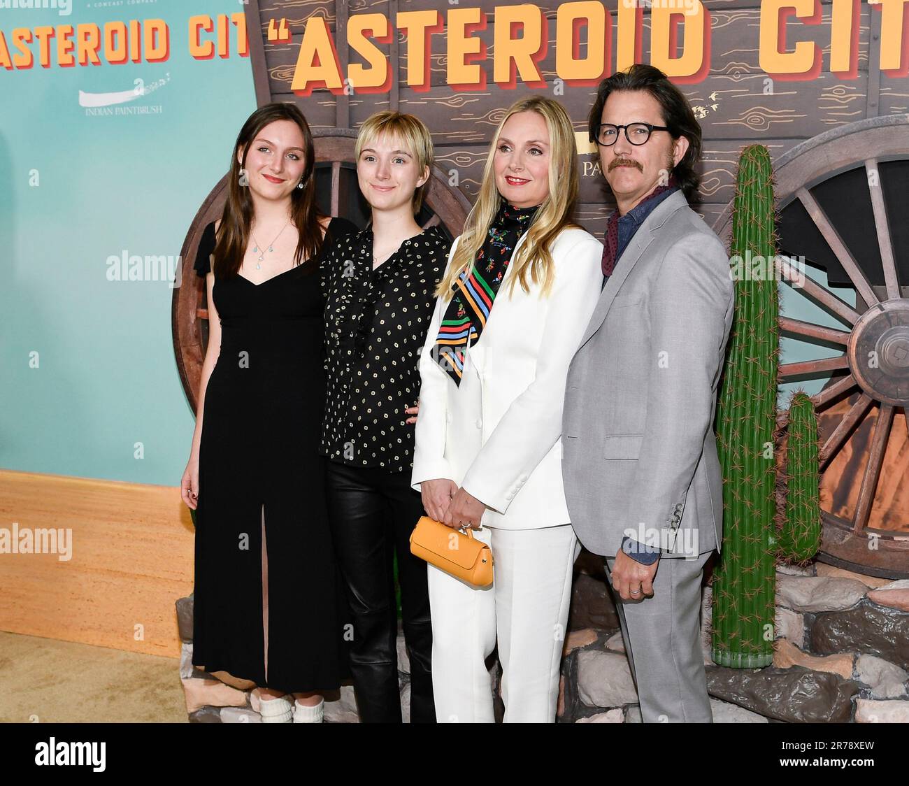Hope Davis, poses with her husband Jon Patrick Walker and their daughters Georgia Walker and Mae ...
