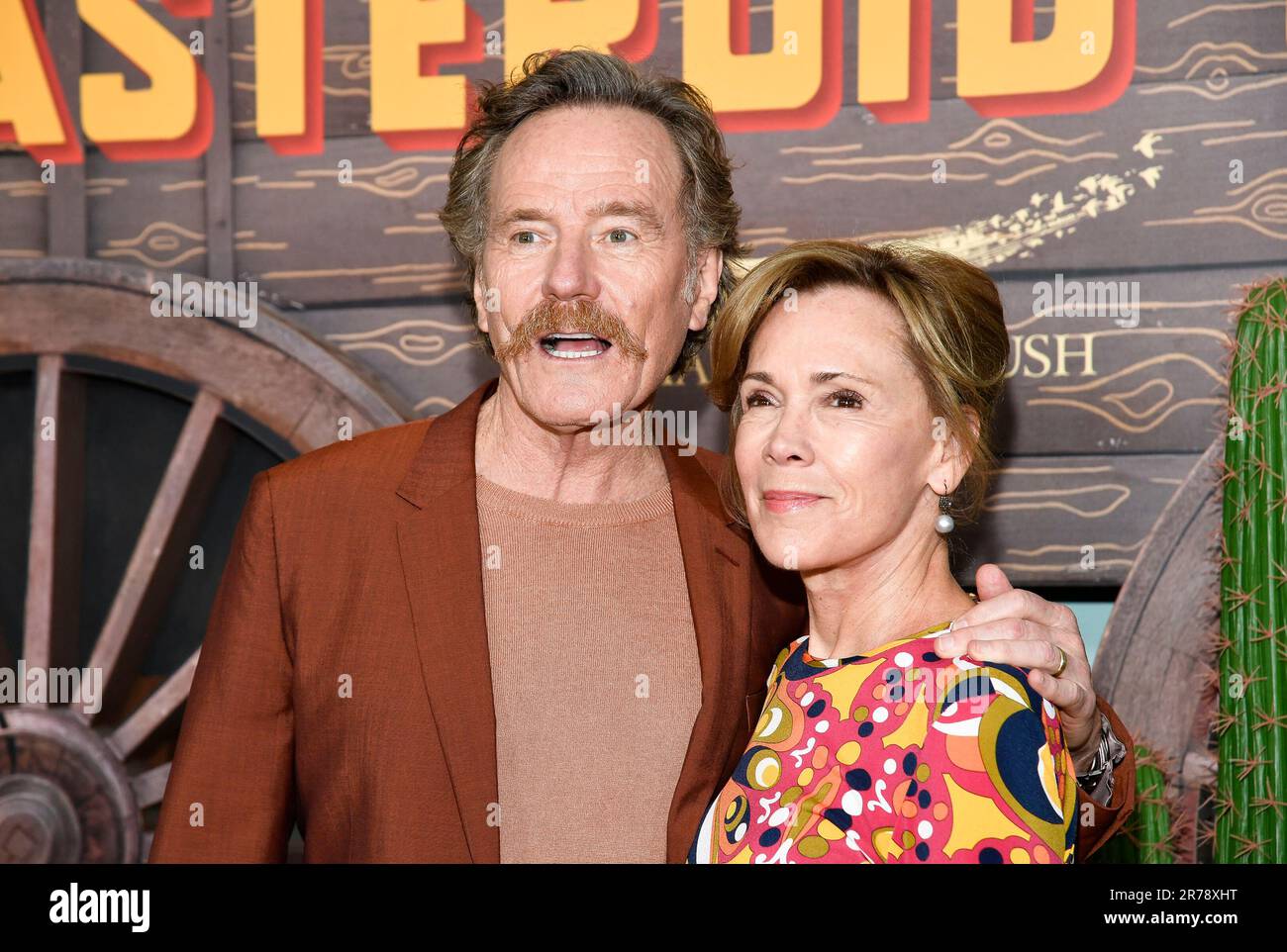 Bryan Cranston, left, and wife Robin Dearden attend the premiere of ...