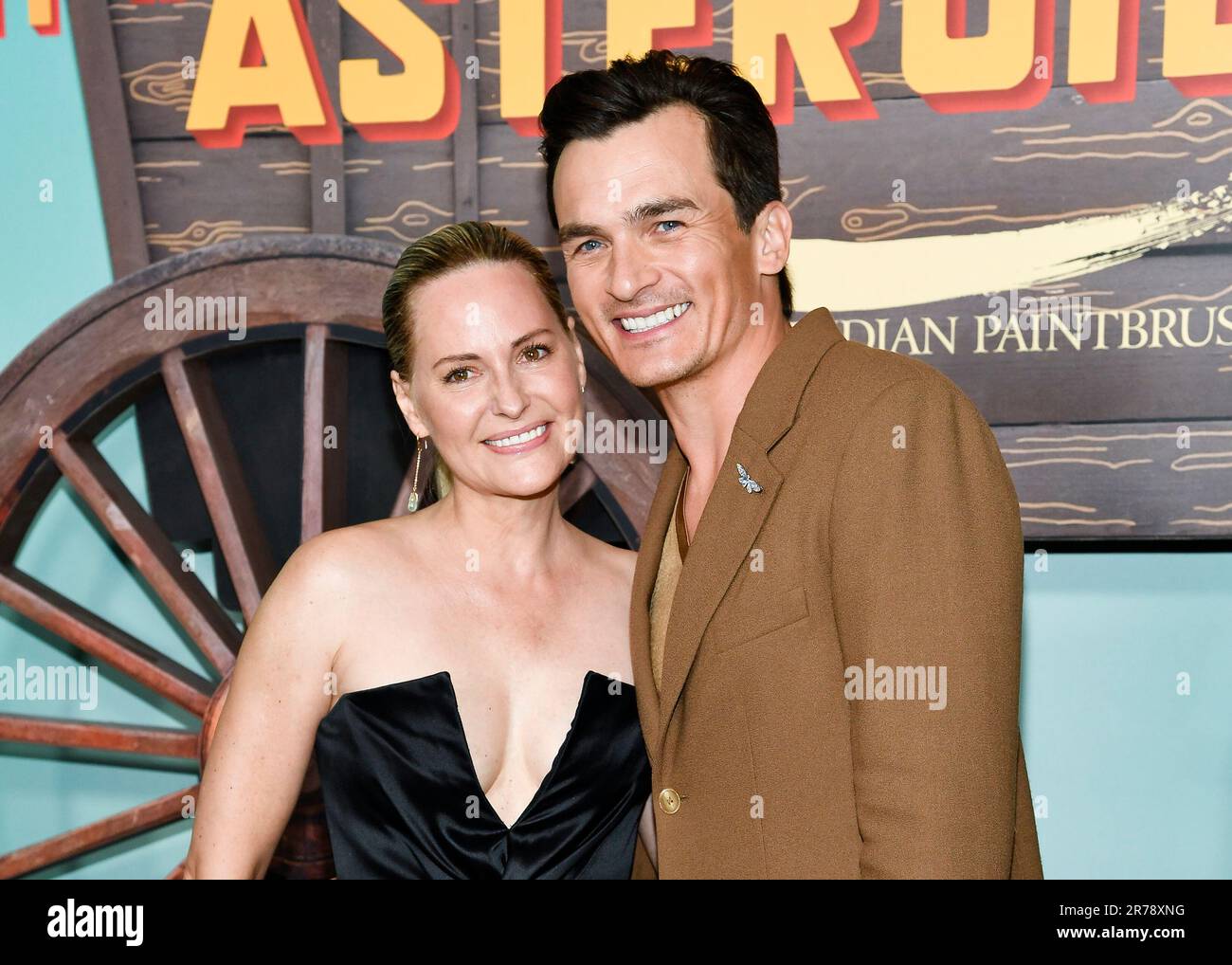Aimee Mullins, left, and Rupert Friend attend the premiere of "Asteroid ...