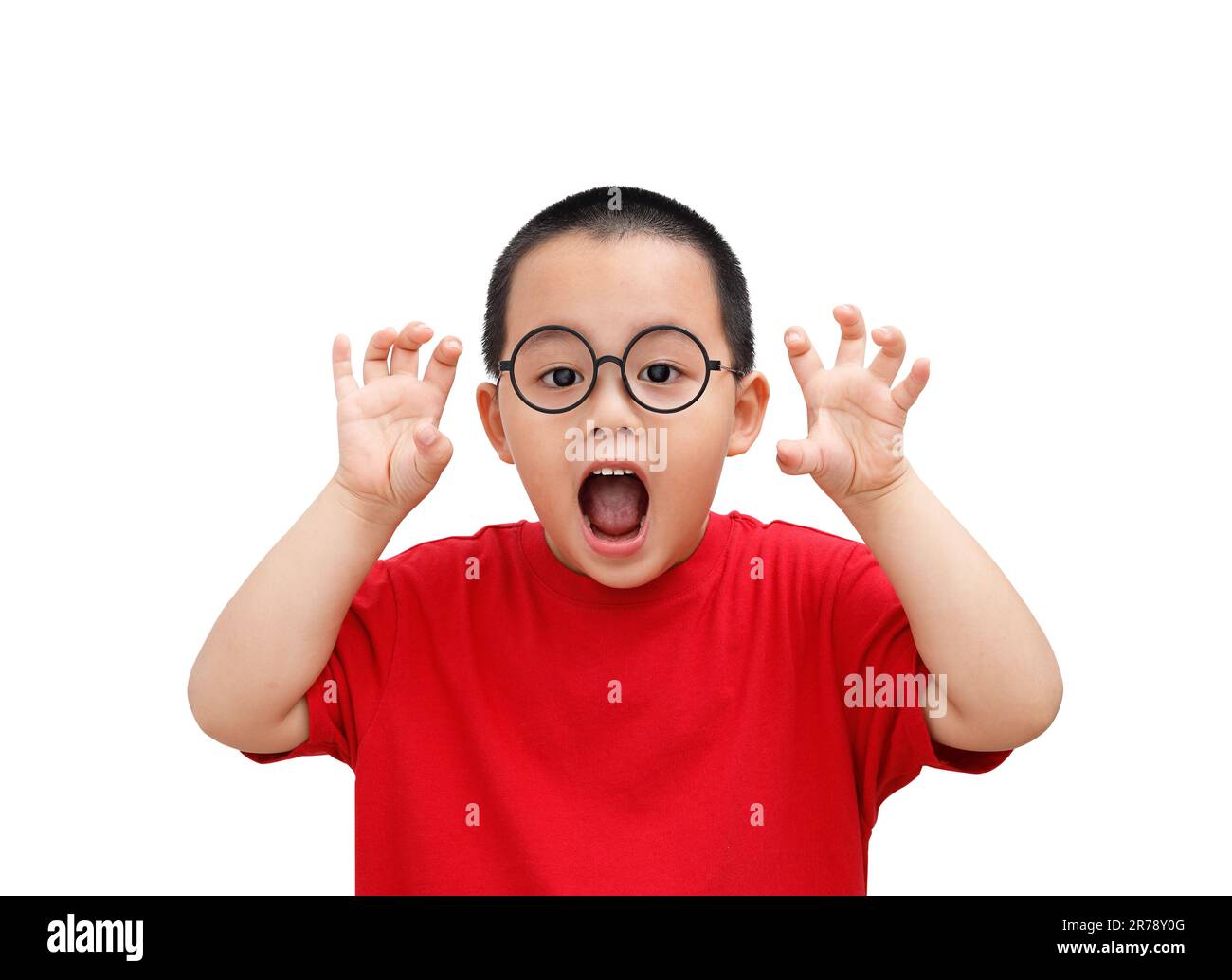 Little boy with spooky hands gesture isolated on white background Stock ...