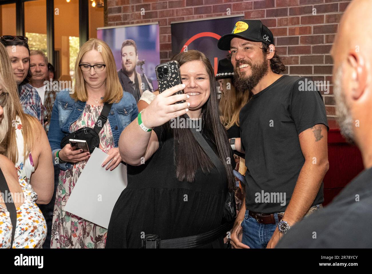 Chris Janson is seen with concertgoers at the Grand Ole Opry on Tuesday ...