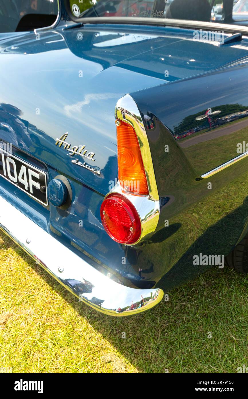 rear lights and wing of 1960s blue ford anglia at vintage classic car ...