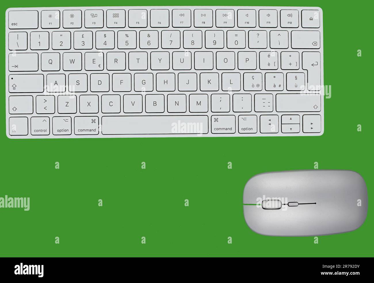 White keyboard and mouse isolated on green background. Top view Stock ...