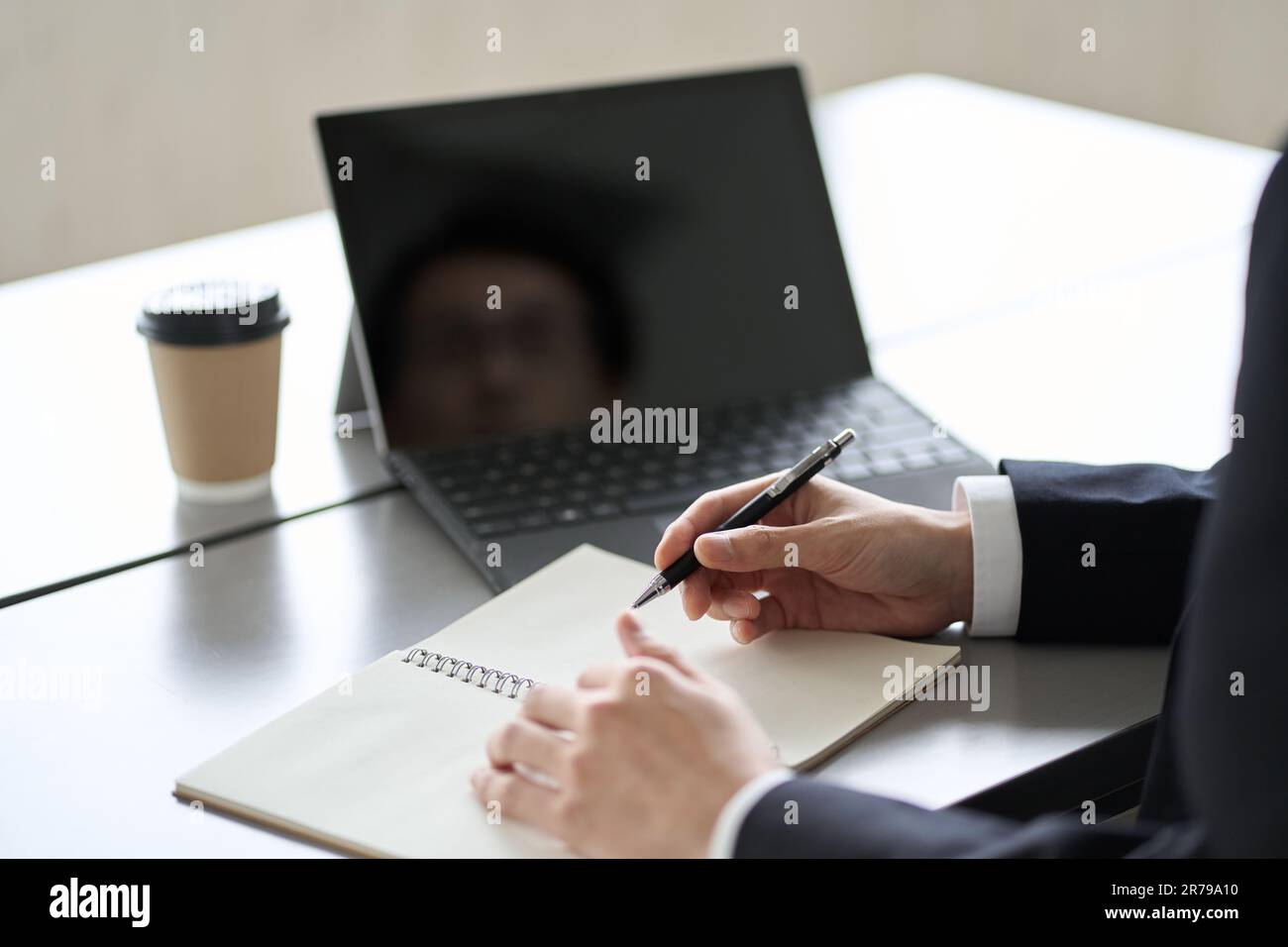 Asian businessman studying online on computer Stock Photo - Alamy