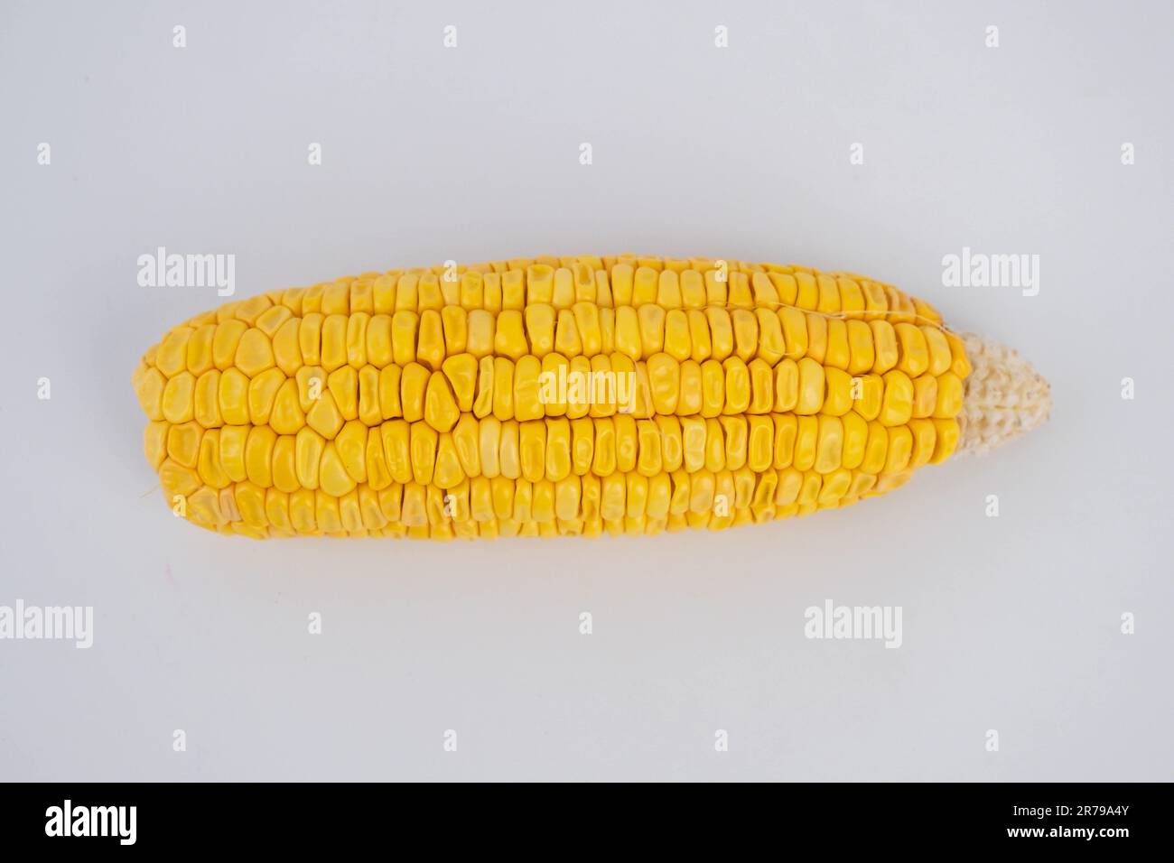 Peeled corn on a white background. Sweet corn vegetables, fresh peeled ...