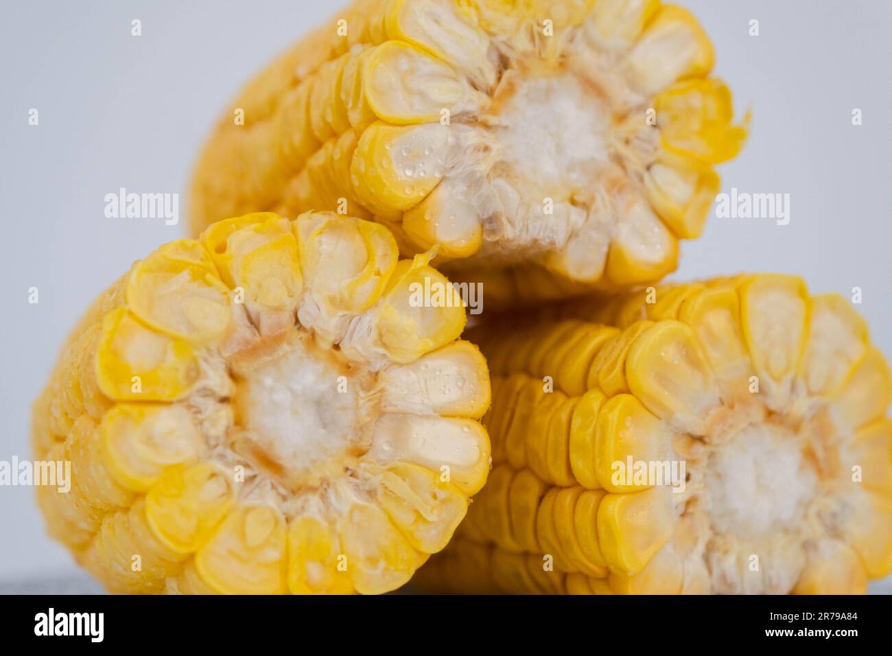Peeled corn on a white background. Sweet corn vegetables, fresh peeled ...