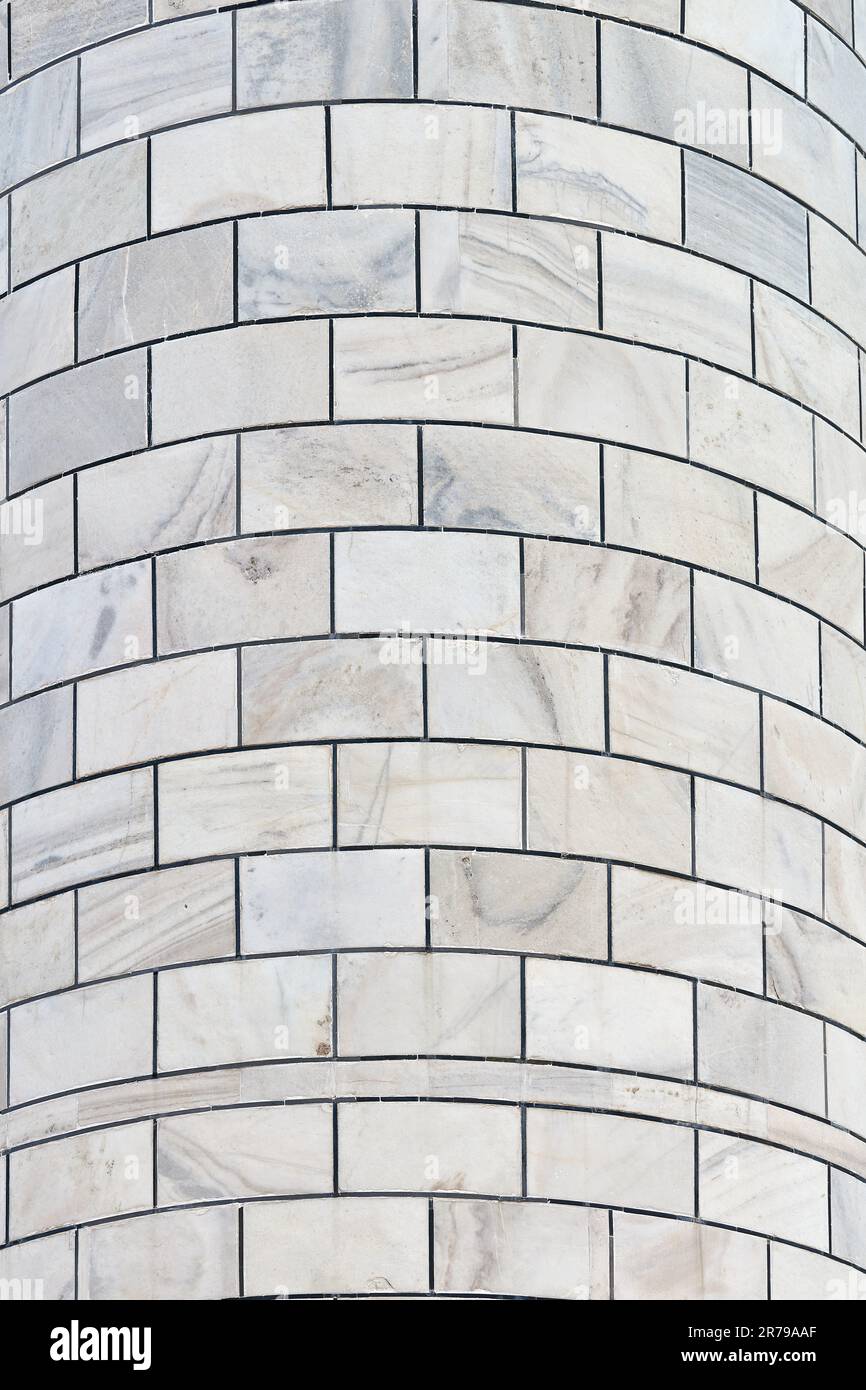 White marble bricks of Taj Mahal minaret towers, close up ivory white ...