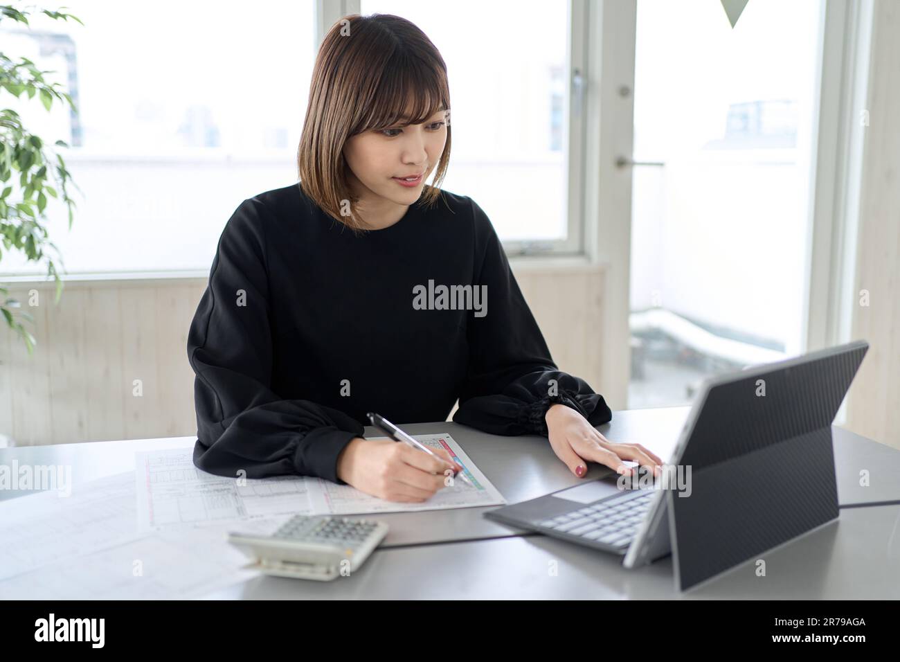 Preparing income tax return hi-res stock photography and images - Alamy