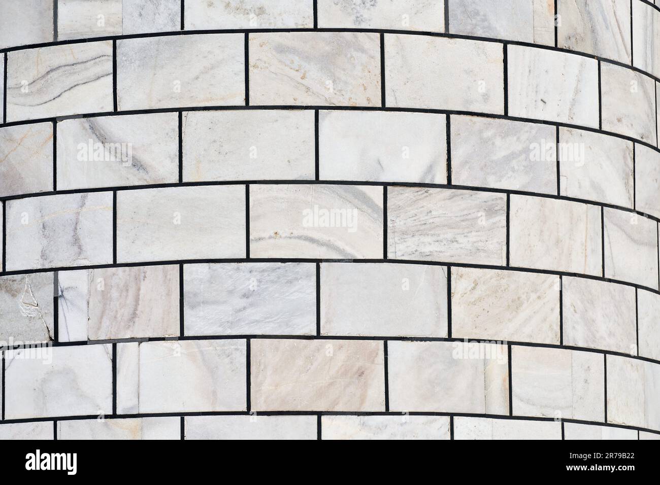 White marble bricks of Taj Mahal minaret towers, close up ivory white ...