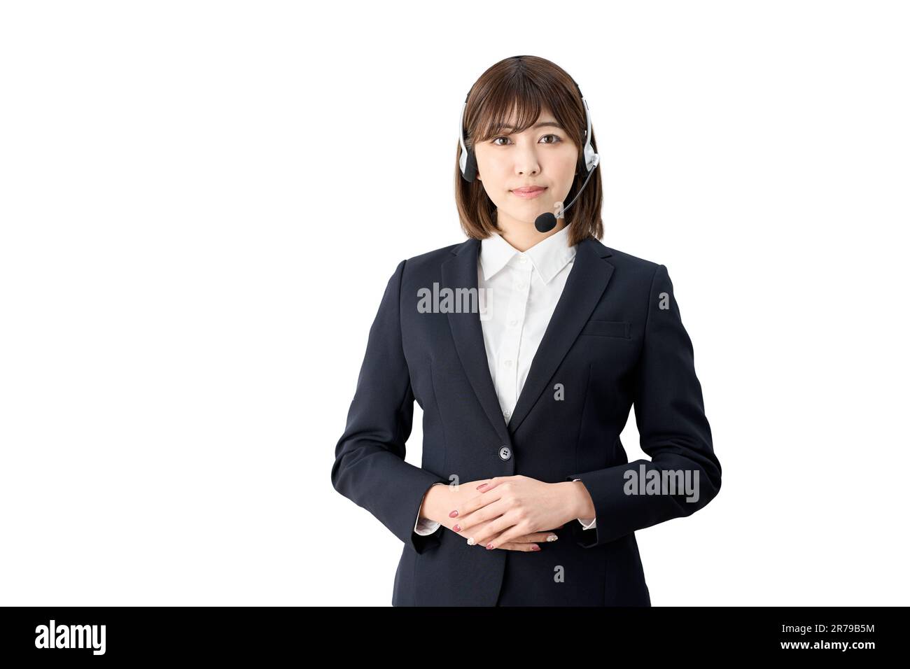 Asian telephone operator standing with headset on Stock Photo - Alamy