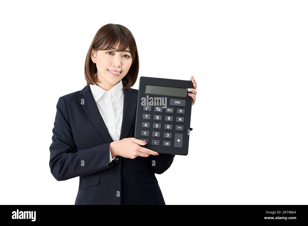 Asian woman showing big calculator Stock Photo - Alamy