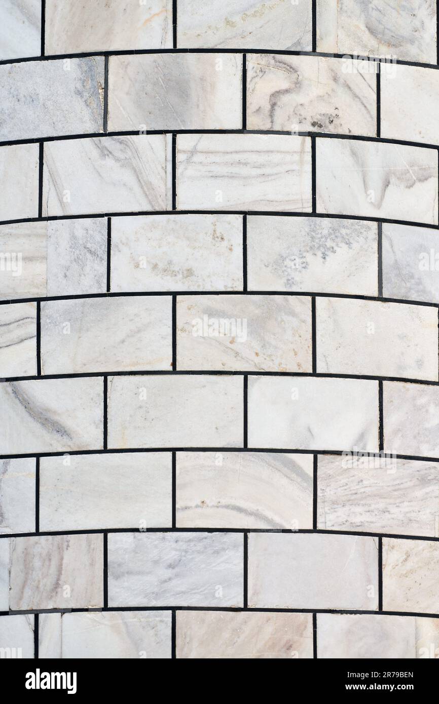 White marble bricks of Taj Mahal minaret towers, close up ivory white ...