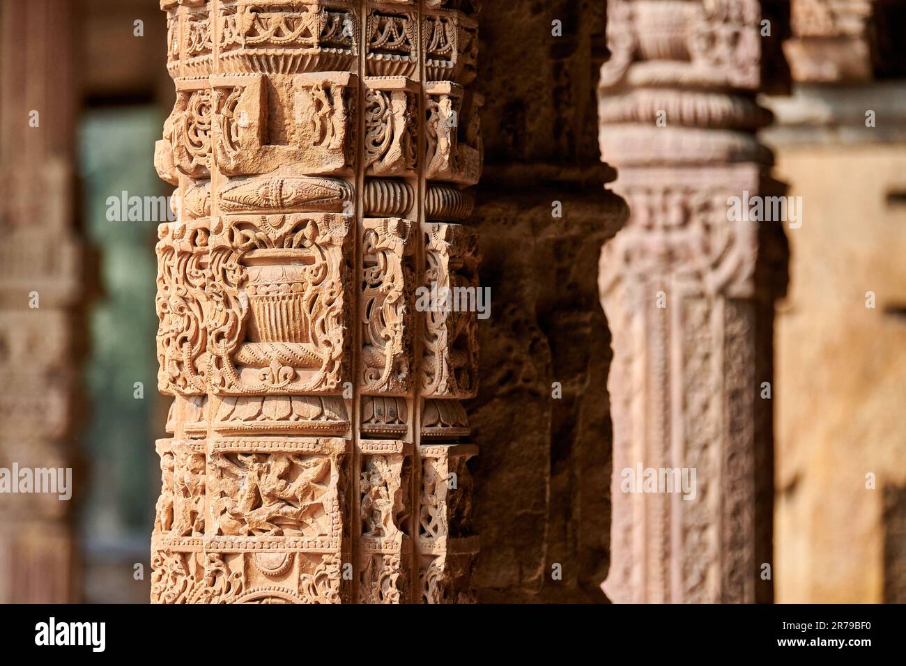 Stone columns with decorative bas relief of Qutb complex in South Delhi ...